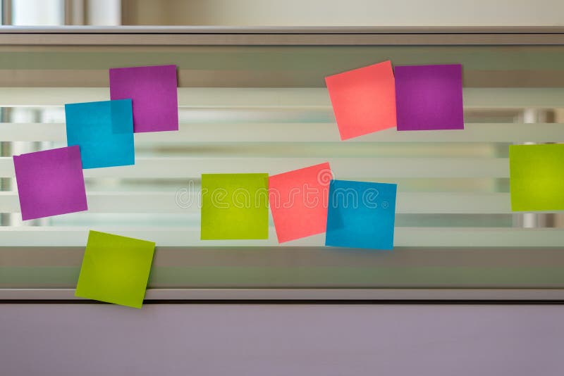 Scattered Colored Sticky Notes Over Glass Screen of a Bench Desk Stock ...