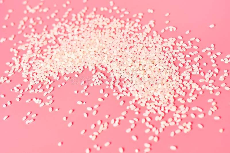 Scattered Rice on Pink Background Stock Photo - Image of healthy ...