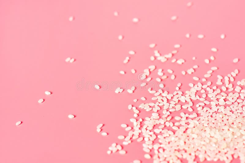 Scattered Grain of Rice on Pink Background Stock Photo - Image of food ...