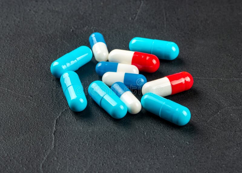 Scattered Multicolored Capsules Stock Image - Image of colored, illness ...