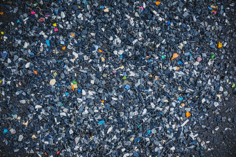 Scattered Pieces of Plastic Products on the Asphalt Stock Photo - Image ...