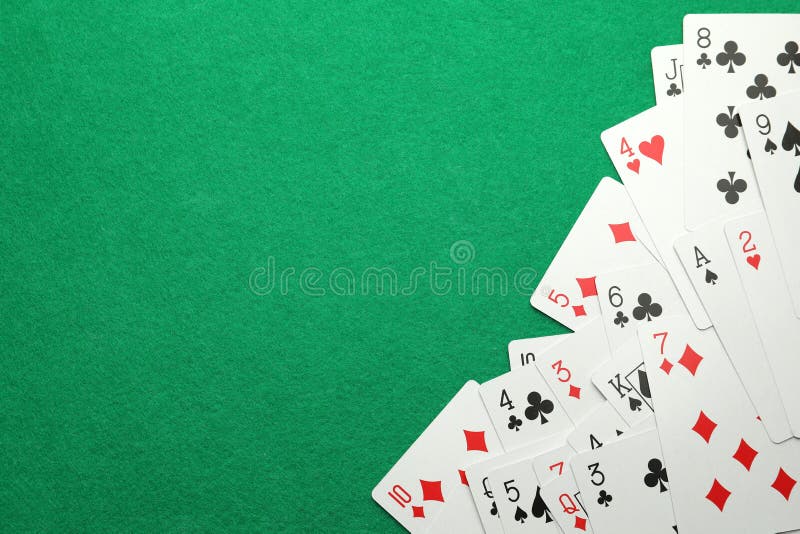 Scattered Playing Cards on Green Table, Top View. Space for Text Stock ...
