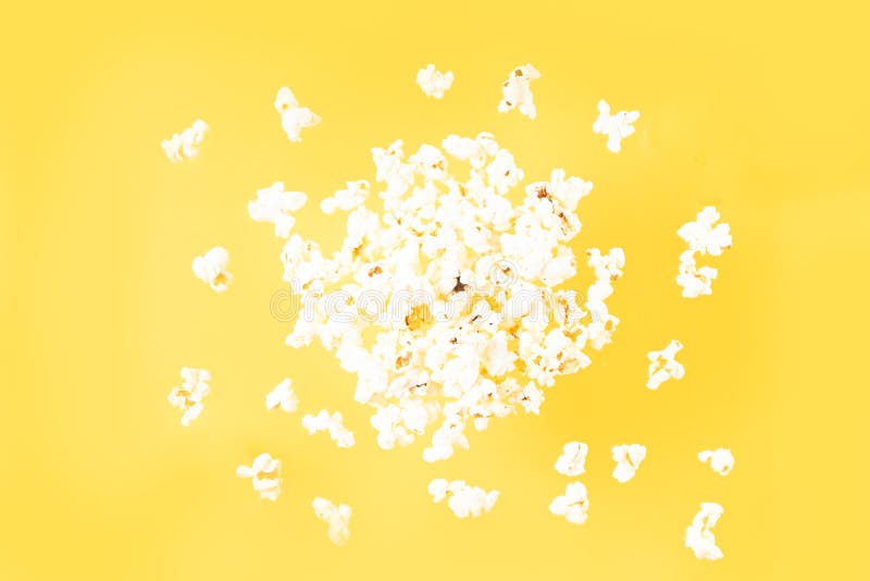 Scattered Popcorn Over Yellow Background Stock Image - Image of copy ...