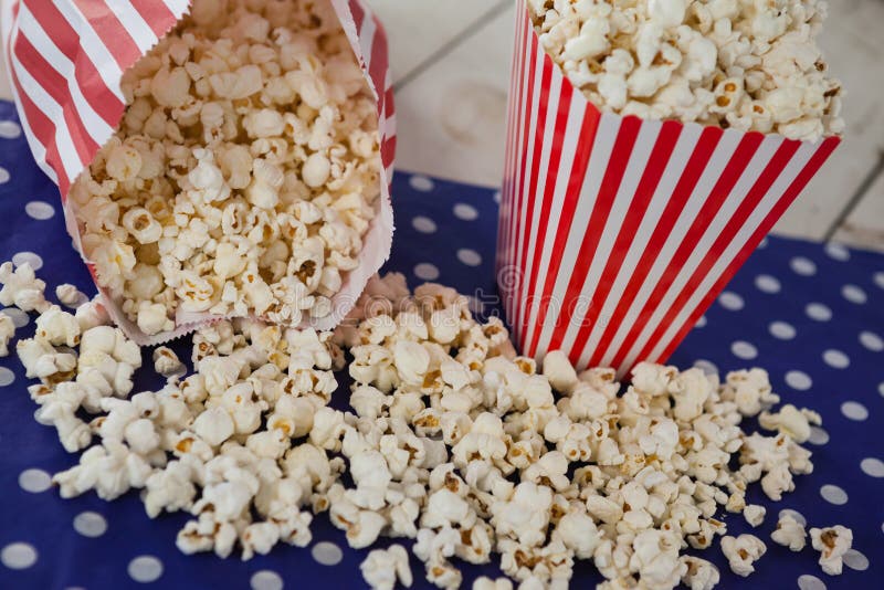 Scattered Popcorn on Wooden Table Stock Image - Image of july, culture ...