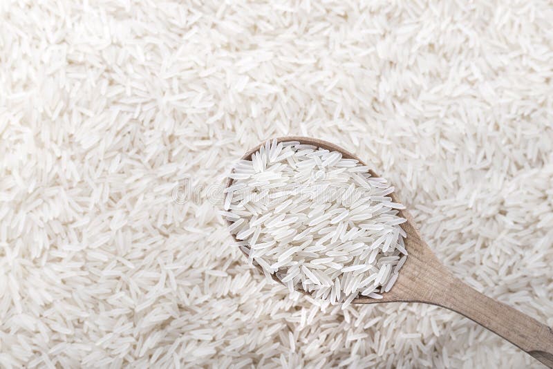 Scattered Raw Rice Background Stock Photo - Image of nutritional, main ...