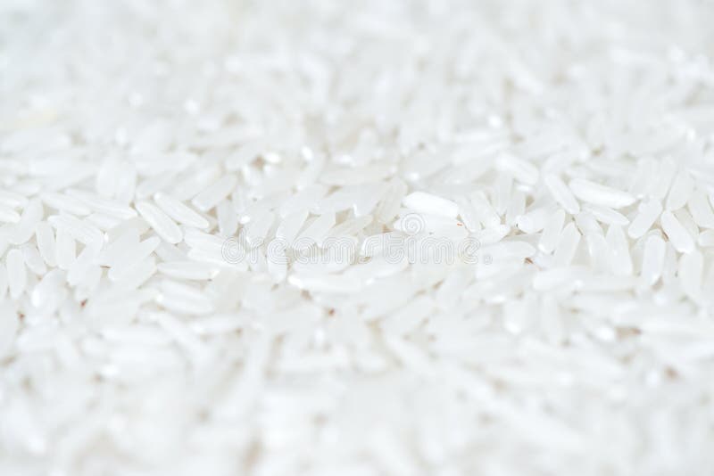 White Rice Grains Scattered on a Wooden Surface Close Up. Food ...