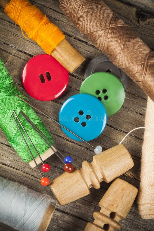 Scattered Sewing Buttons and Threads Stock Image - Image of clothing ...