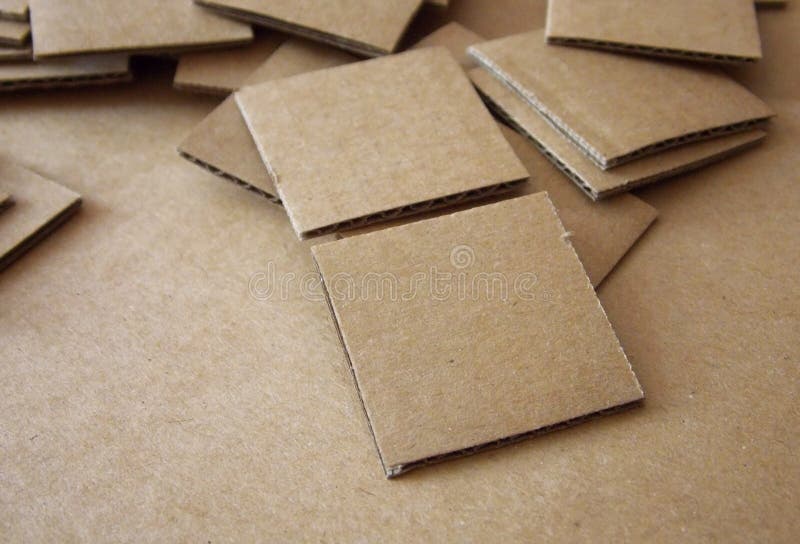 Scattered Square Pieces of Cardboard Close Up Stock Photo - Image of ...