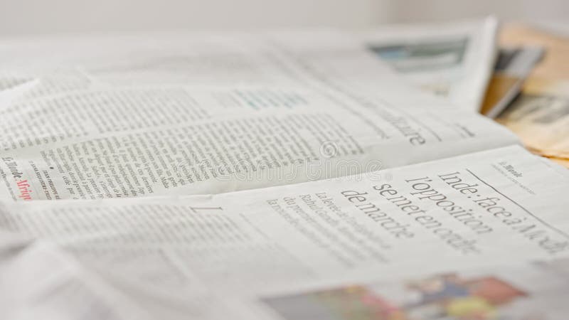 A Scattered Stack of Newspapers on the Table. Stock Footage - Video of ...