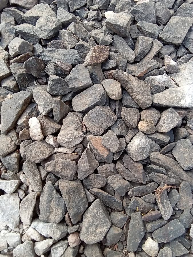 Scattered and Stacked Ash Stones Background Stock Photo - Image of wall ...