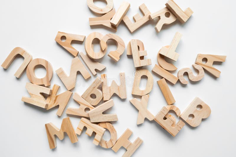 Scattered Wooden Alphabet Letters on White Background Stock Photo ...