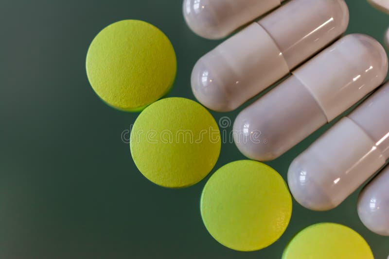 A Scattering of Different Pills and Capsules Stock Photo - Image of ...
