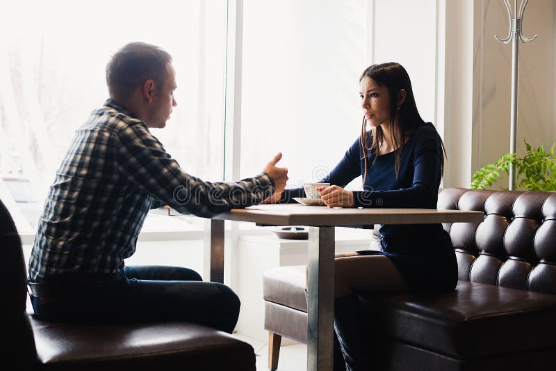 Scene in Cafe - Couple Conflict Arguing during the Lunch. Stock Image ...