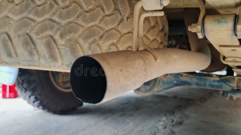 Vehicle Exhaust Pipe and Undercarriage on Dirt Surface Stock Footage ...