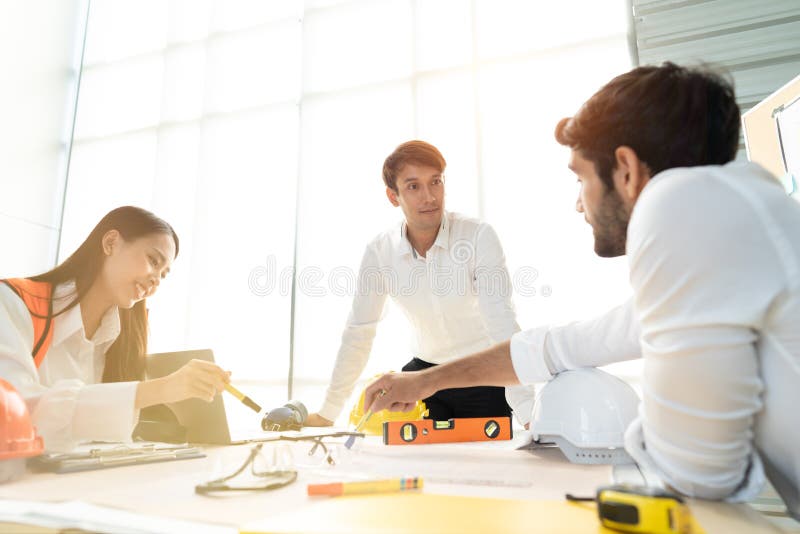Scene of Construction Group Engineers Discussing about the New Project ...