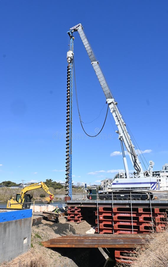 A Scene of Construction Work Around the River. Stock Photo - Image of ...