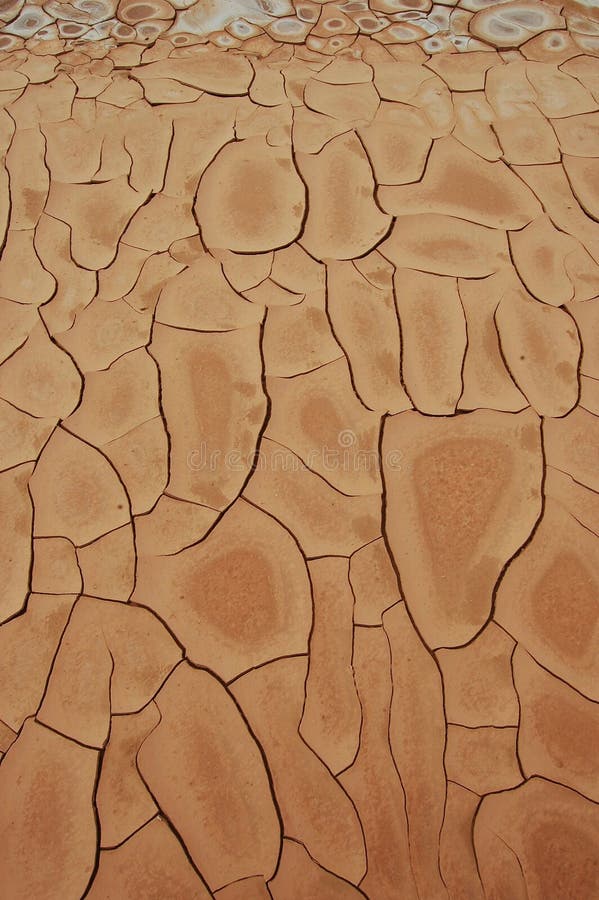 Scene of a Desolate Desert Landscape with a Cracked Earth Surface Stock ...