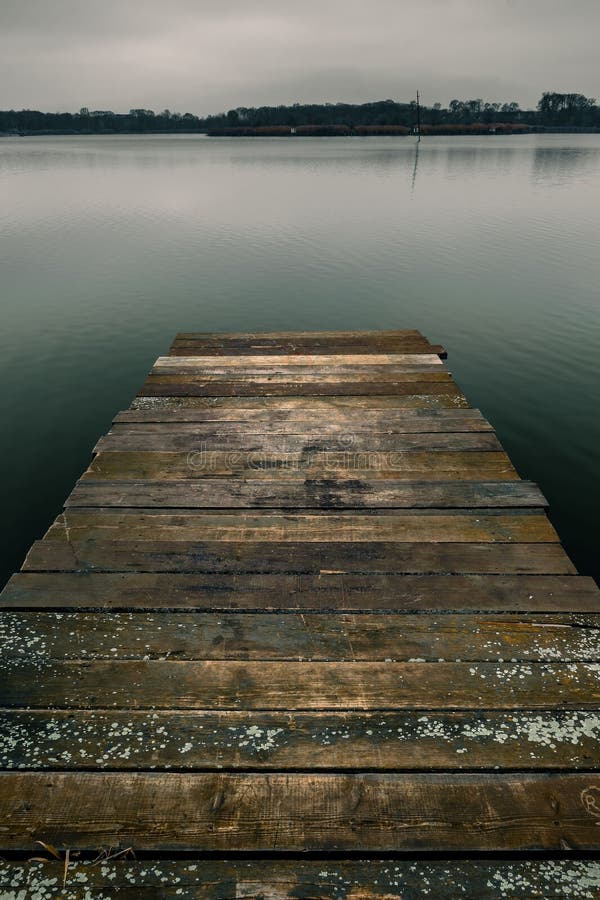 Scene of an Empty Dock Situated in Middle of a Tranquil Body of Water ...