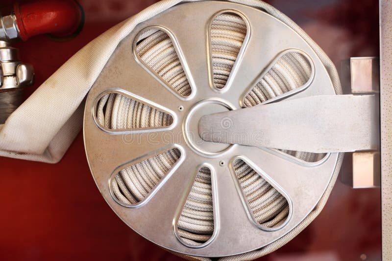 Scene of fire hose detail stock photo. Image of detail - 25103058