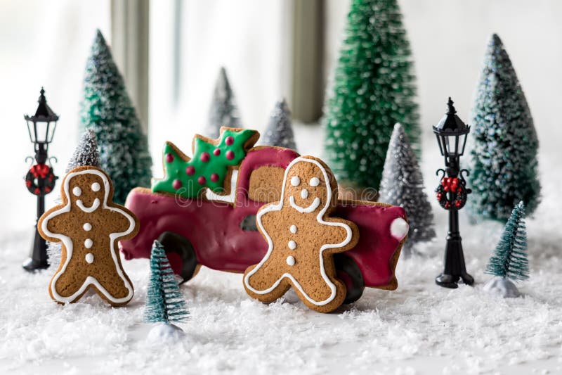 A Scene of a Gingerbread Cookie Couple Harvesting a Tree for the ...