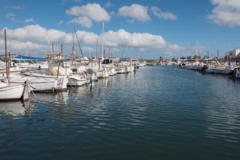 Scene in the Harbor with Boats and Yachts Against a Blue Sky Stock ...