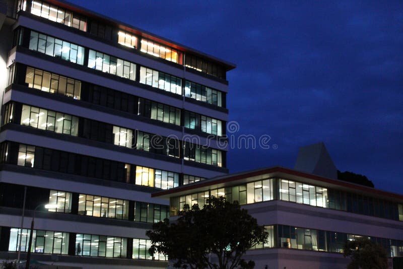 Office Building at Night stock image. Image of night - 145822163