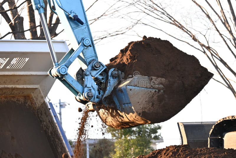Scene of Road Construction by Hydraulic Excavator. Stock Photo - Image ...