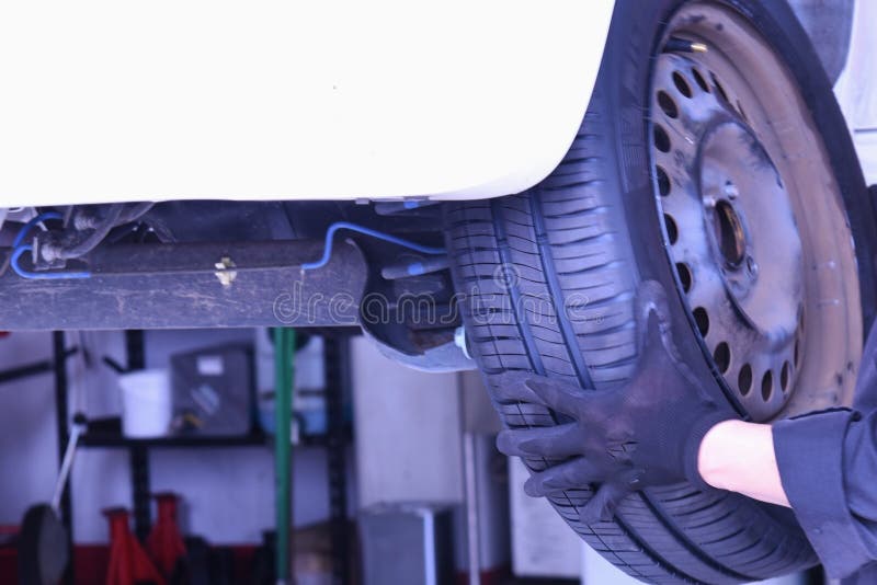 A Scene of Tire Replacement Work Stock Image - Image of maintenance ...