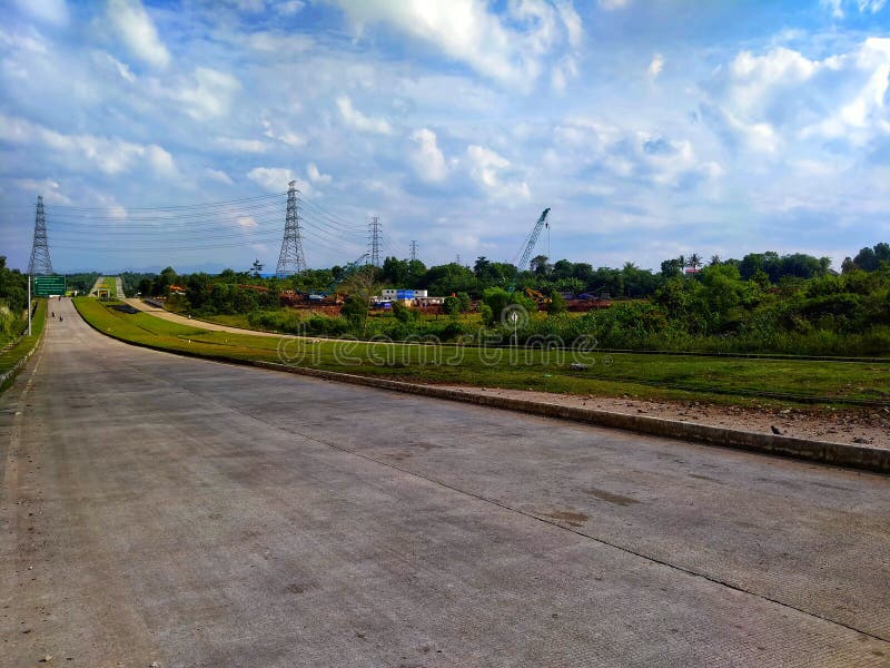 The Scenery Along the Highway is Full of Greenery Stock Photo - Image ...