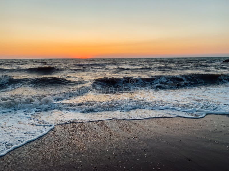 Scenery Beach and Sea Waves with Sunset on the Horizon Stock Image ...