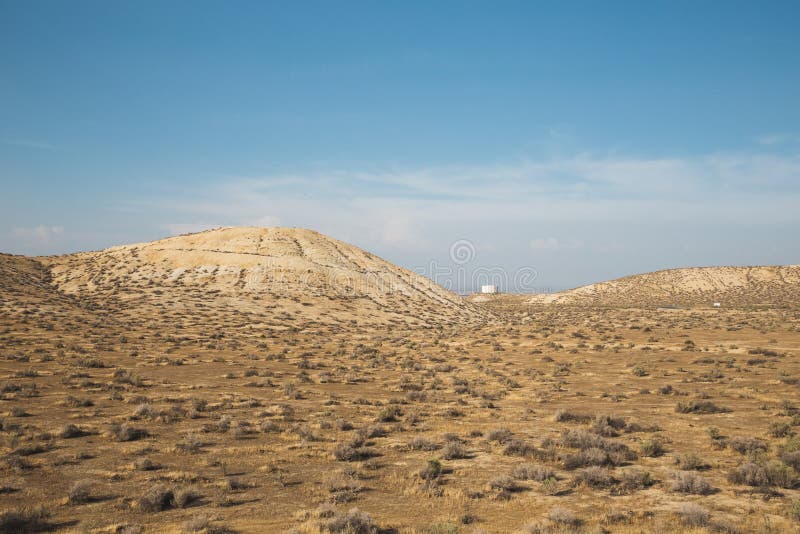 Scenery of Deserted Field in California with Rolling Hills Under a Blue ...