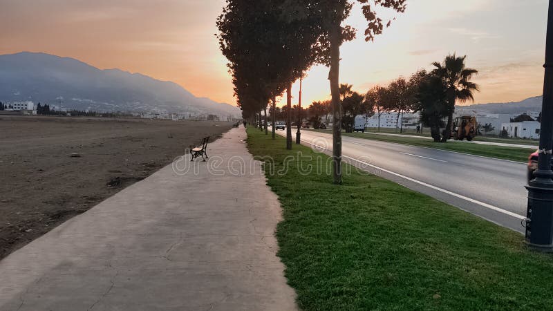 Scenery between a Empty Land and a Road Stock Image - Image of sundown ...