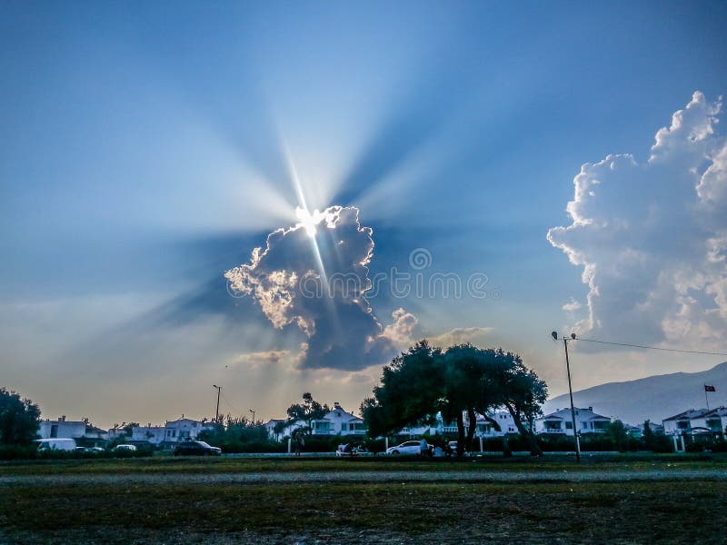 Scenery of Hidden Sun Behind the Clouds with a Tree Stock Image - Image ...
