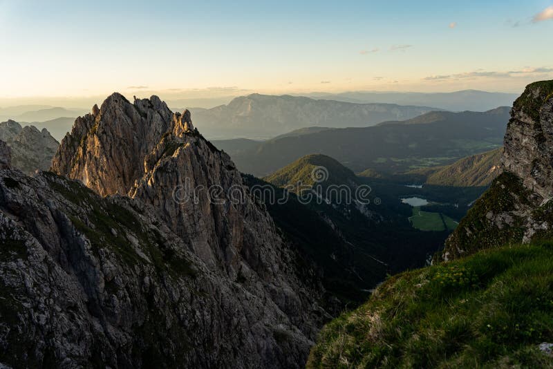 Scenery of the Mount Mangart Surrounded by High Hills during Sunset ...