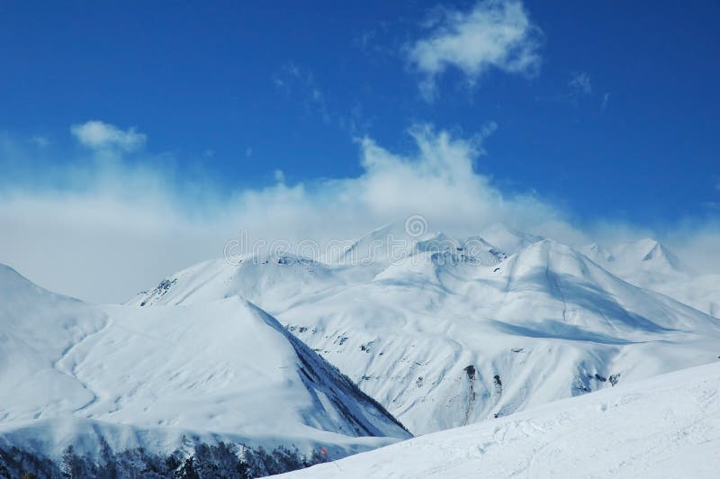 Snow and Mountains at Elevation Stock Image - Image of alpine, clouds ...