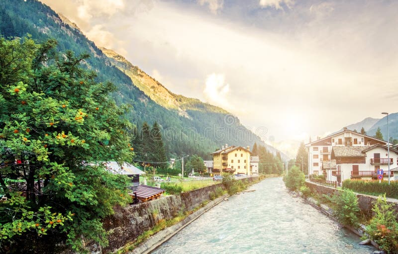 Scenery of River in Alpine Town Stock Photo - Image of landscape, green ...