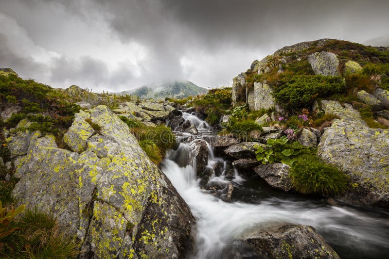 Scenery in the Romanian Alps, with Stormy Cloudscape and Granite Slabs ...