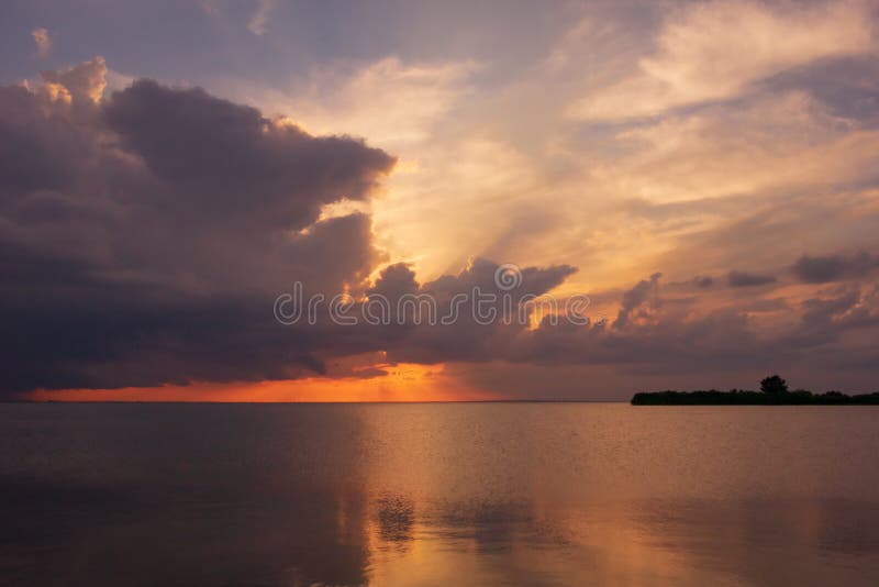 Scenery of Sunset in a Calm Ocean Stock Image - Image of clouds, season ...