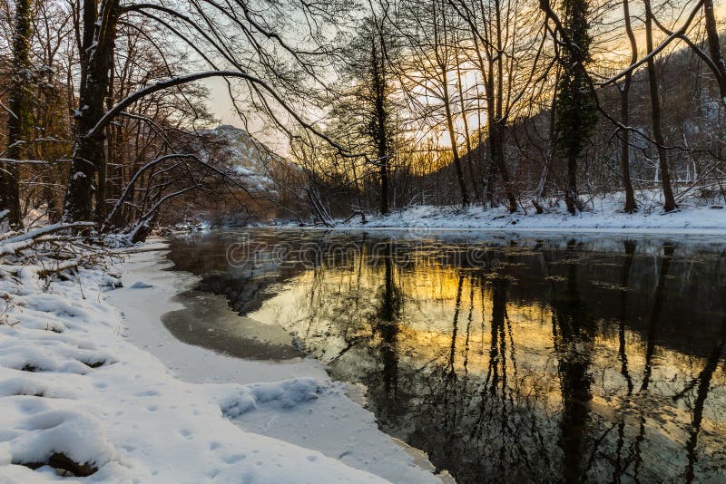 Scenery of Wild River with Sunset Sky Reflection in the Mountains, in ...