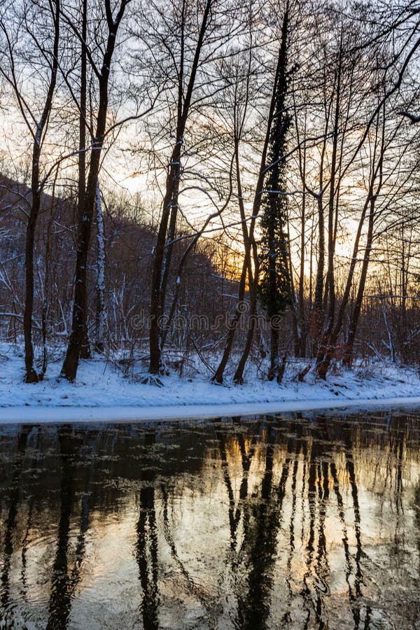 Scenery of Wild River with Sunset Sky Reflection in the Mountains, in ...