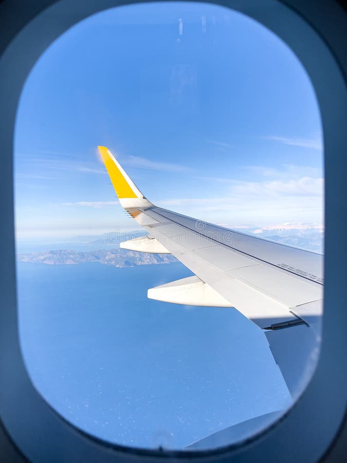 Scenic Aerial View of Landscape through an Airplane Window Stock Image ...