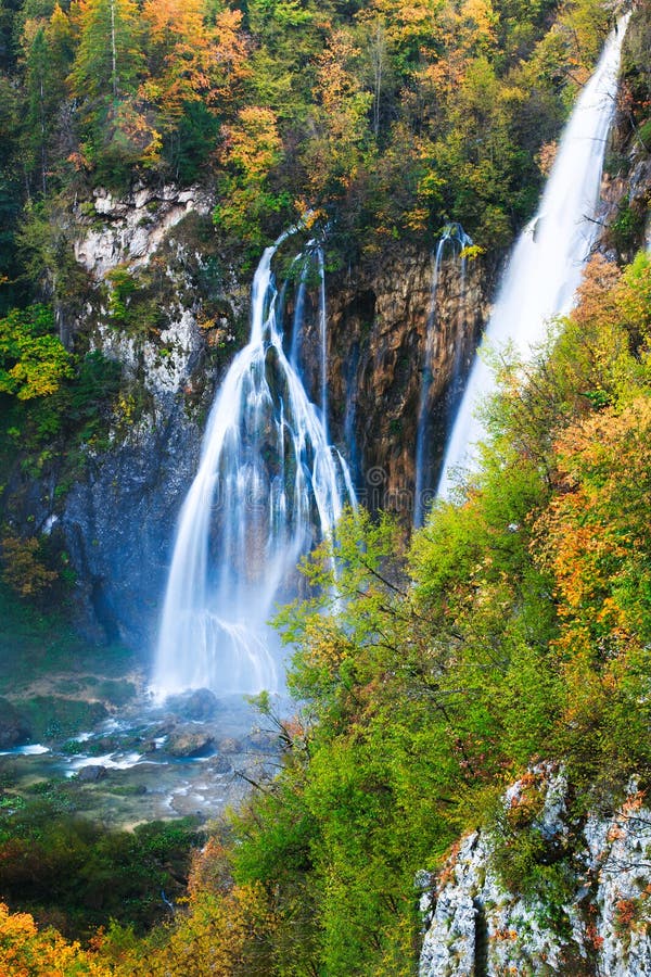 Scenic Autumn Waterfall in Serene Forest Setting Stock Image - Image of ...