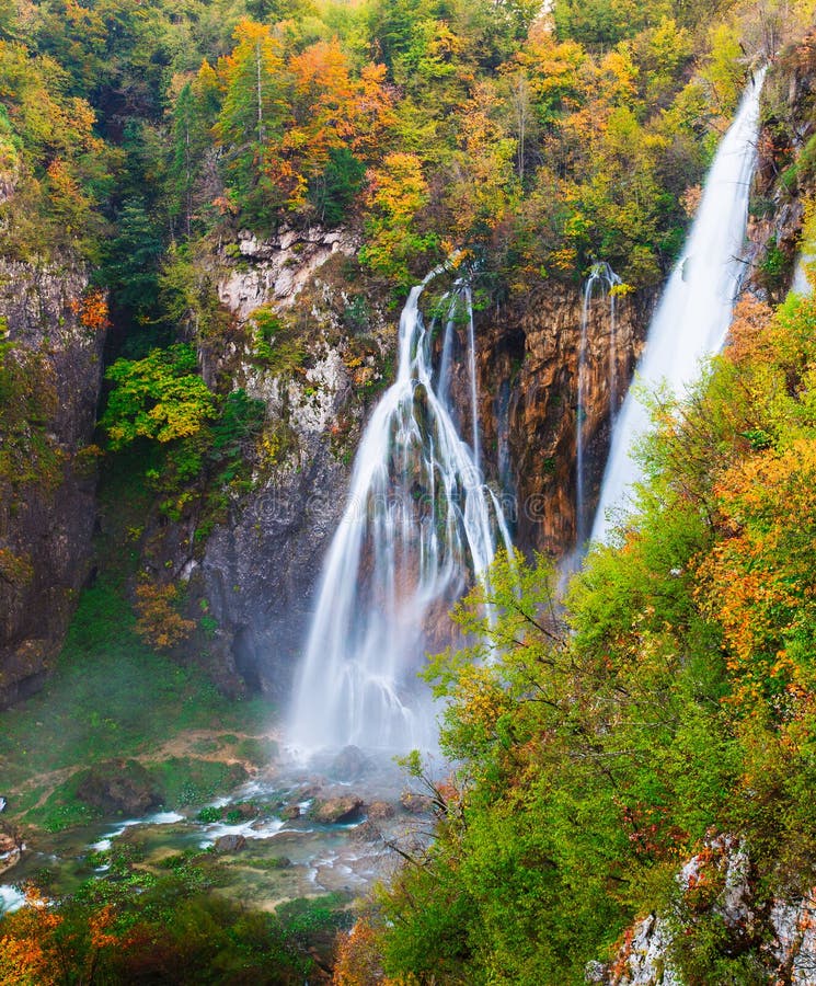 Scenic Autumn Waterfall in Serene Forest Setting Stock Image - Image of ...