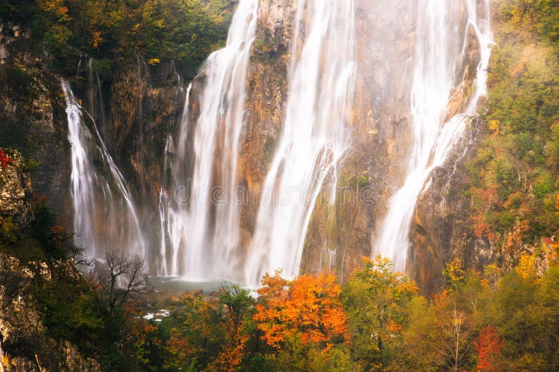 Scenic Autumn Waterfall in Serene Forest Setting Stock Image - Image of ...
