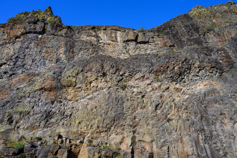 Scenic Basalt Rock Cliffs with Lichen on a Sunny Spring Day, As a ...