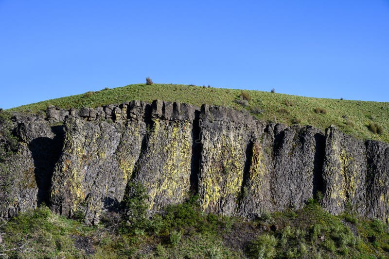 Scenic Basalt Rock Cliffs with Lichen on a Sunny Spring Day, As a ...