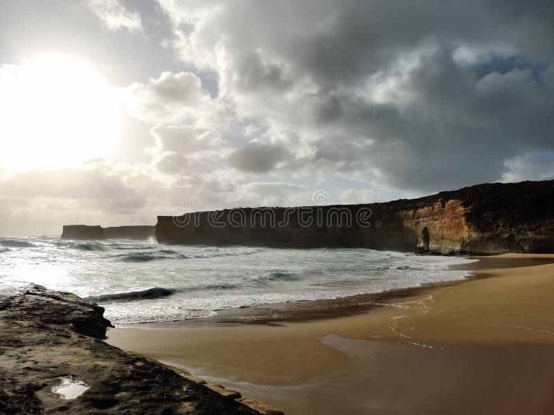 Scenic Beach with Waves and Cliffs Backdrop. Twelve Apostles, Melbourne ...
