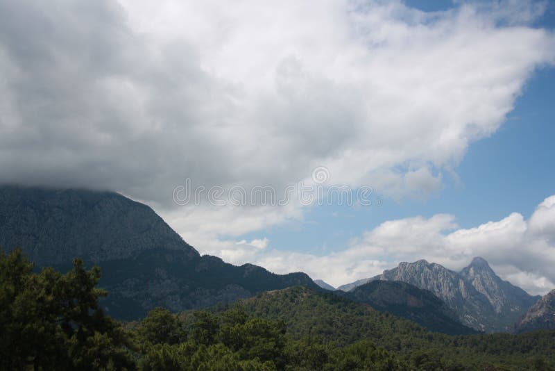 Scenic and Beautiful View of Mountains and White Clouds on Peaks Stock ...