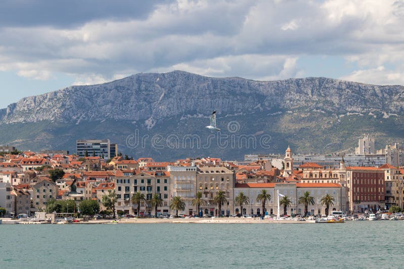 Scenic Coastal View of a Mediterranean Town with Mountains and ...