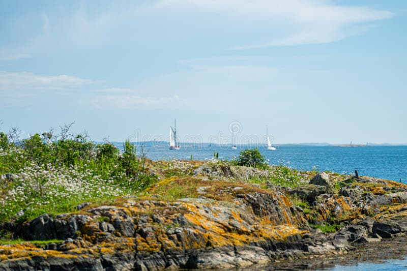 Scenic Coastal View with Rocks and Boats.. Stock Image - Image of ...